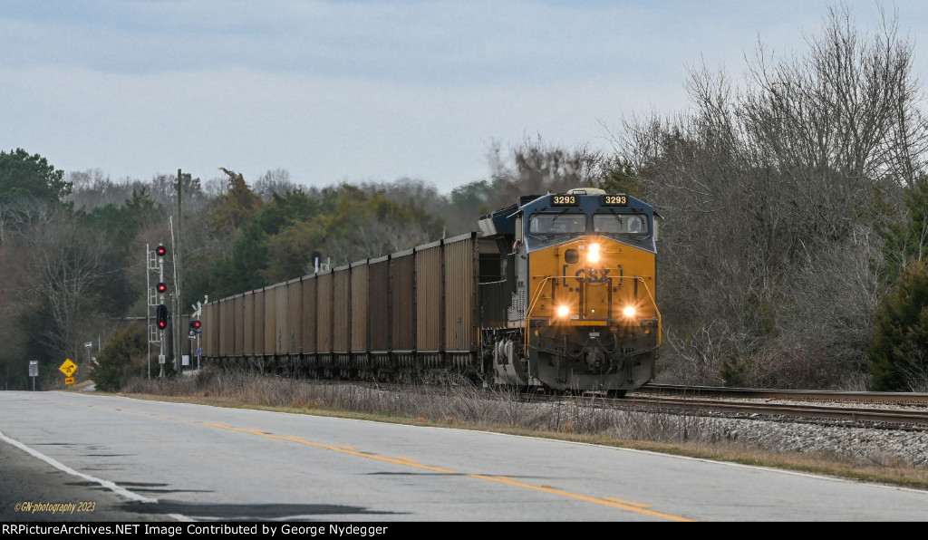 CSX 3293 leads an empty coal train